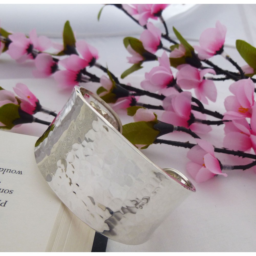 A Gorgeous Sterling Silver Wide Hammered Torq Bangle