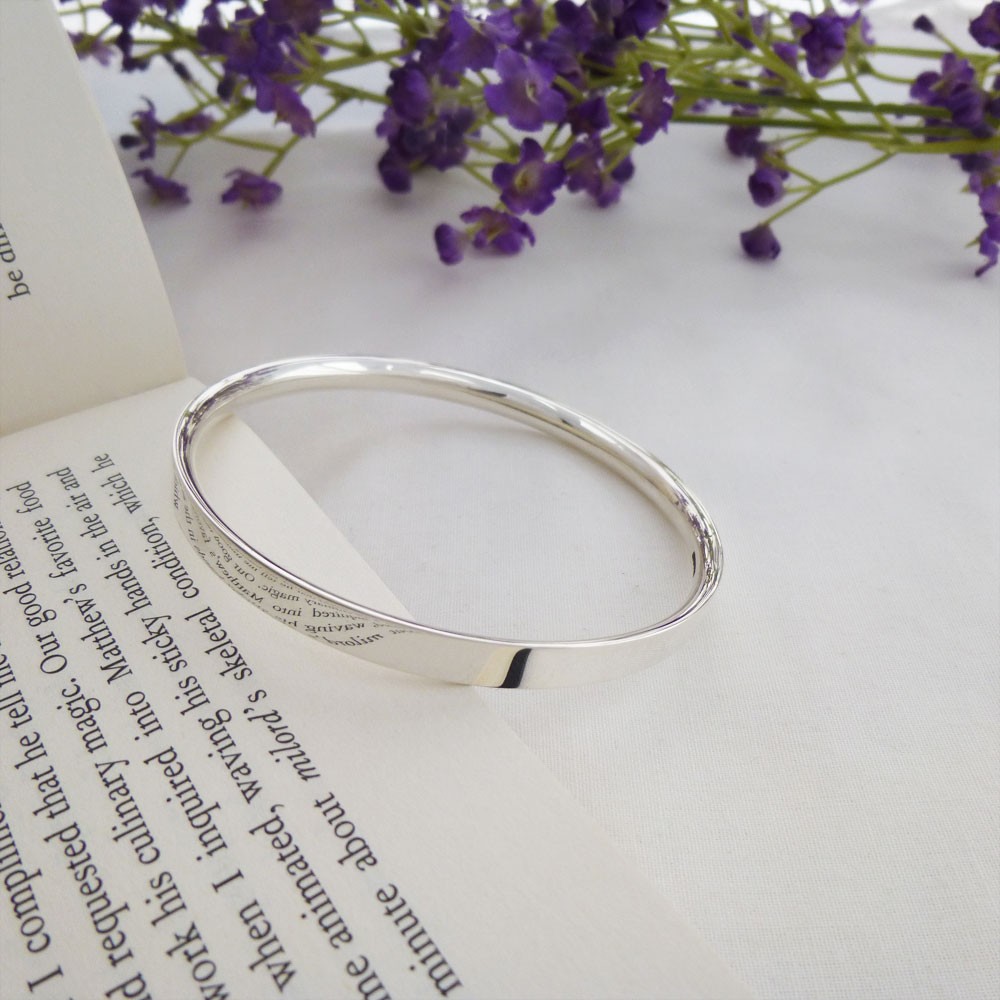 Engravable Solid Sterling Silver Bangle with a Unique Design.