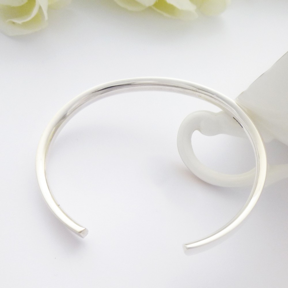 Solid Sterling Silver Torq Bangle with Beautiful clean lines.