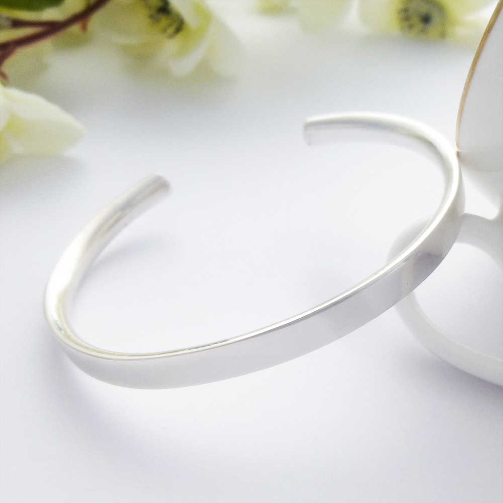 Solid Sterling Silver Torq Bangle with Beautiful clean lines.