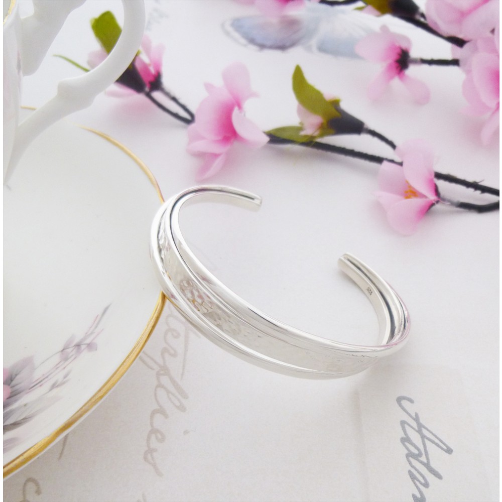 Ladies Silver Torque Bangle Featuring a Hammered Silver Effect