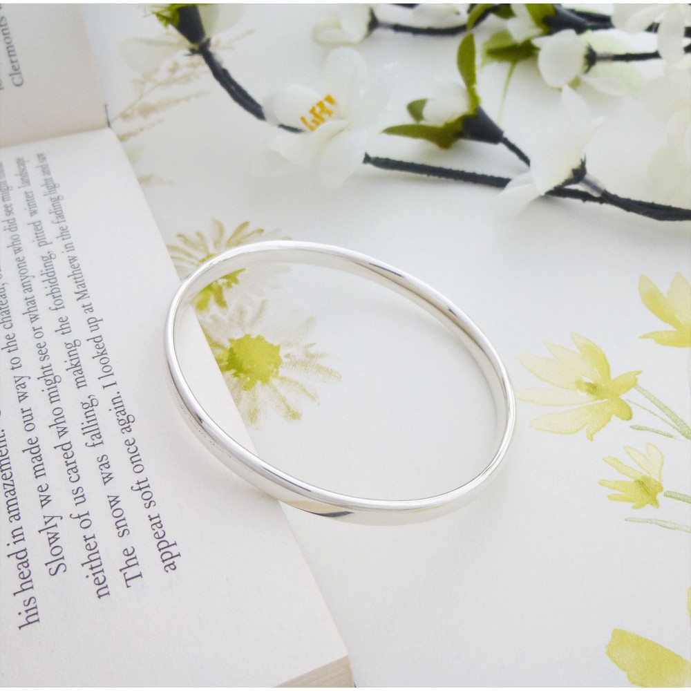 Malia Oval Section Round Sterling Silver Ladies Bangle