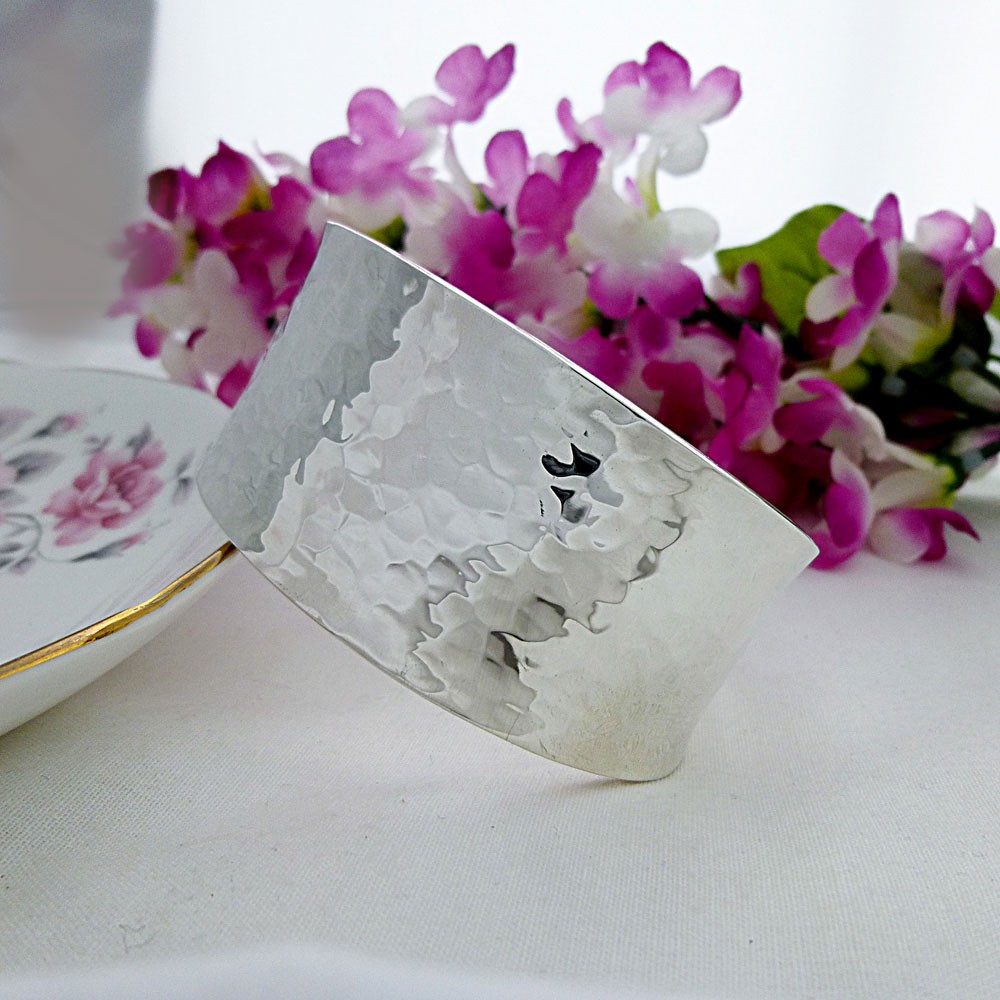 A Gorgeous Sterling Silver Wide Hammered Torq Bangle