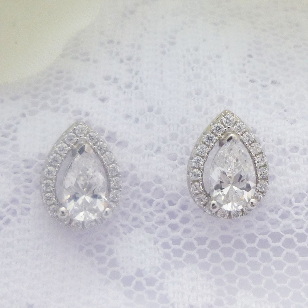 Teardrop Shaped Silver Drop Stud Earrings with CZ stones