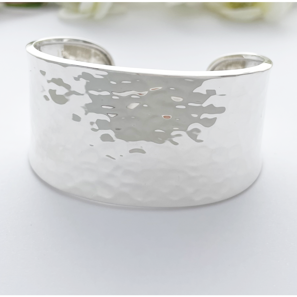 A Gorgeous Sterling Silver Wide Hammered Torq Bangle